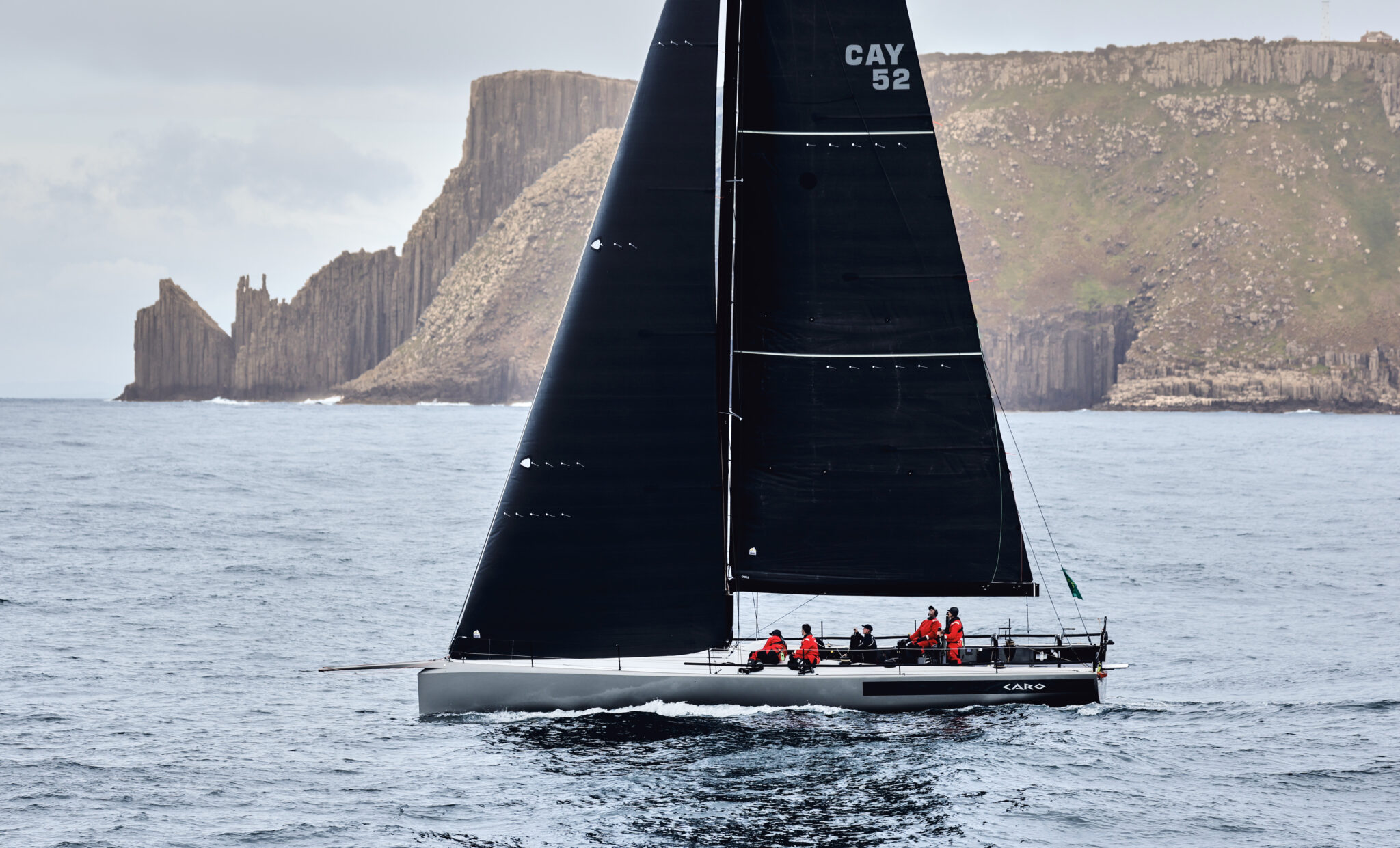 Wind becoming elusive as mini-maxis round Tasman Island - Cruising ...